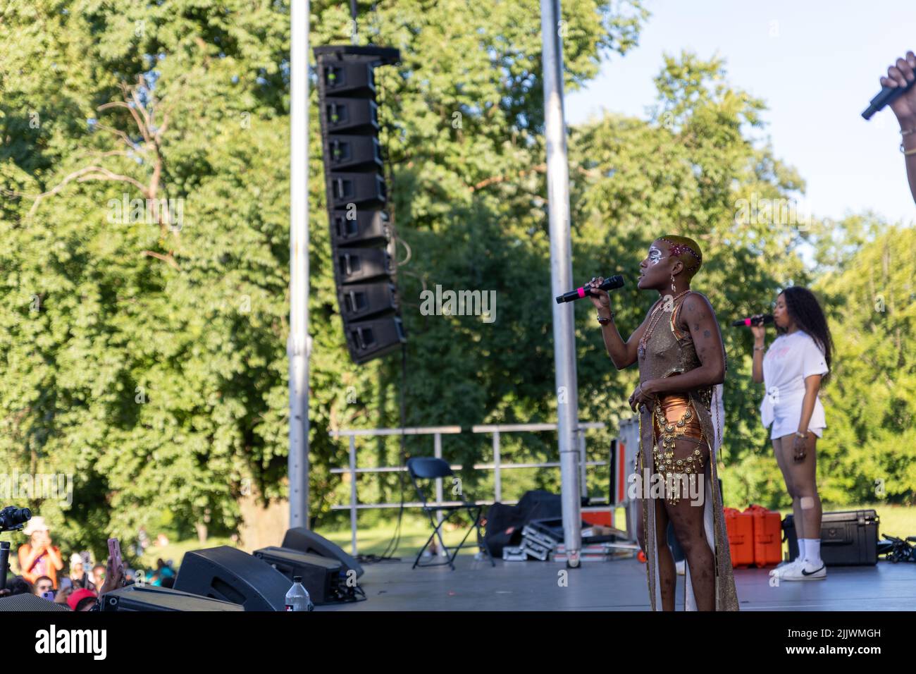 A closeup shot of a singer at the 13th Annual Juneteenth celebration in ...