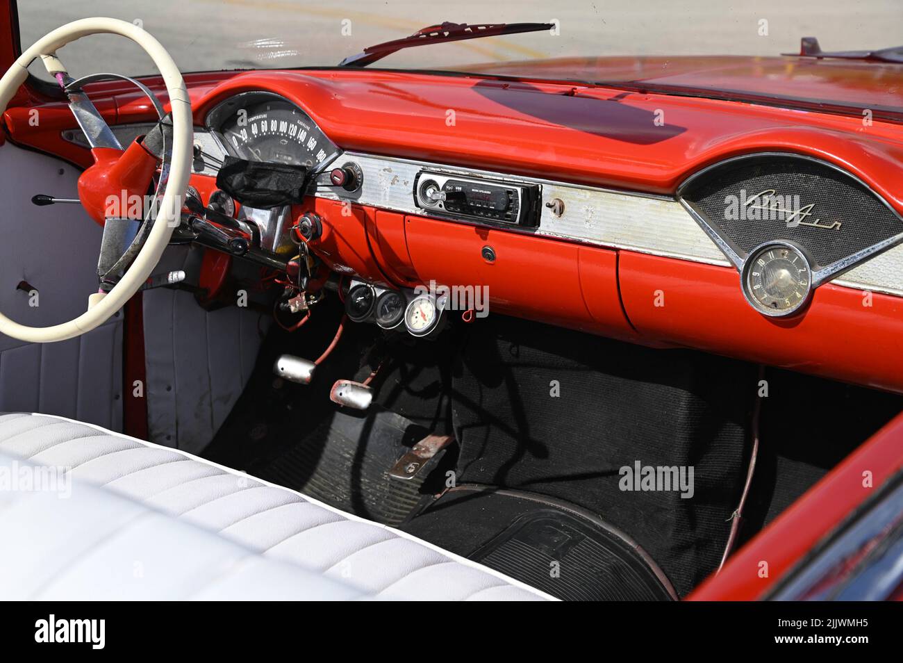 Vintage red 1950 Chevrolet Bel Air antique car interior, dashboard and ...