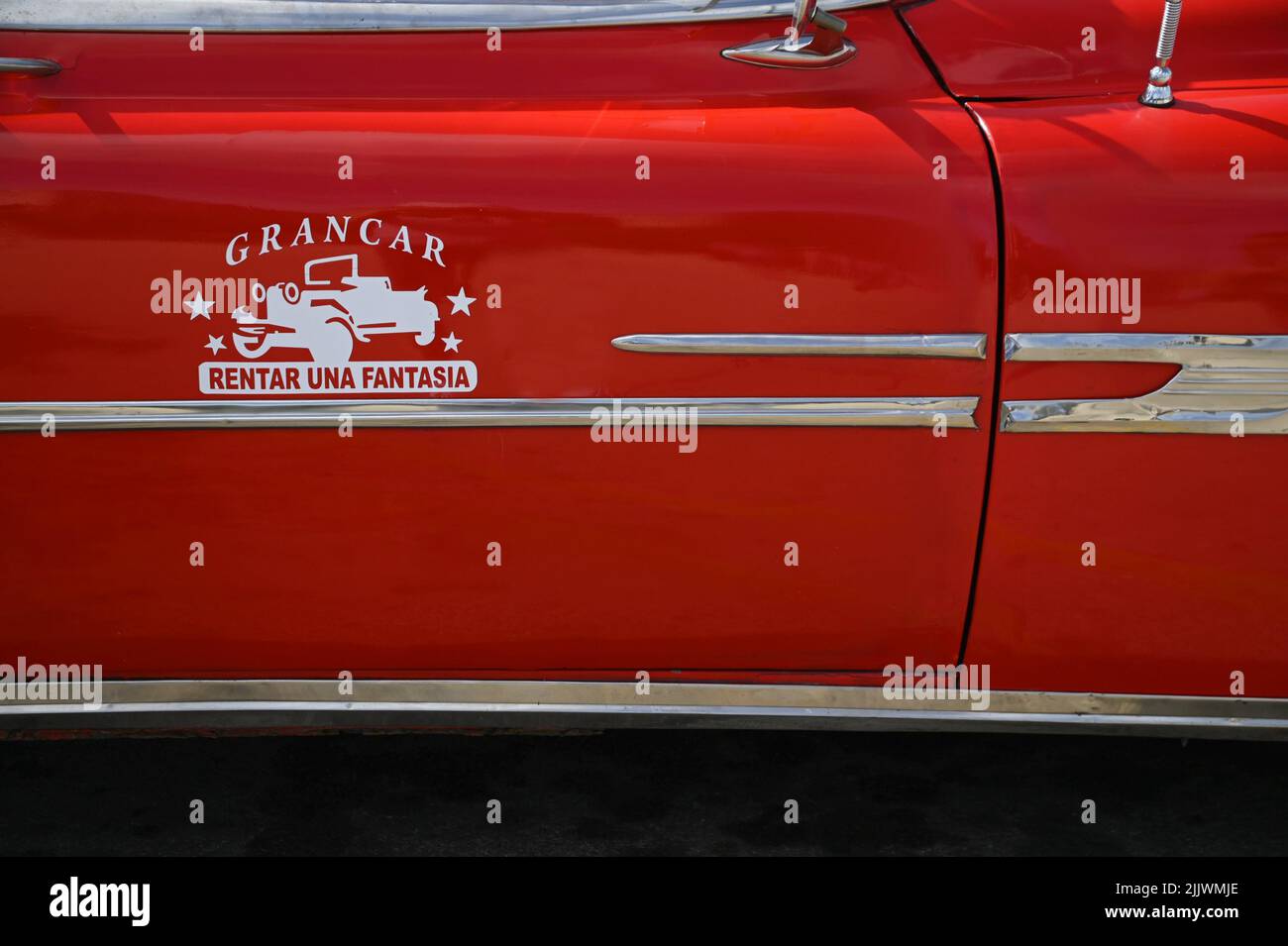 Vintage 1957 red Pontiac Chieftain antique car with chrome details used ...