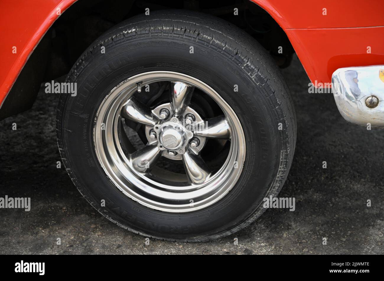 Vintage red 1950 Chevrolet Bel Air black side wall wheel with chrome ...