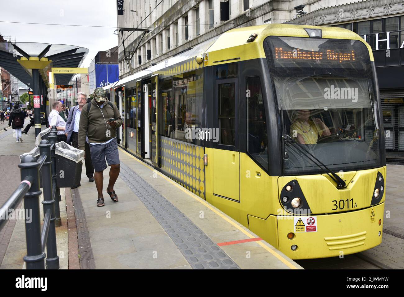 A Manchester Metrolink tram in the city centre, Manchester, Greater ...