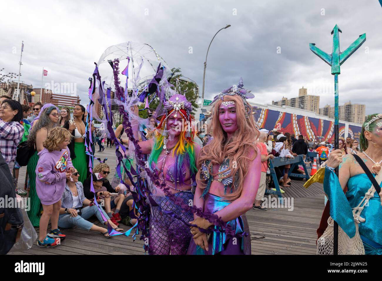 A closeup of two young women dressed like mermaids at the 40th Annual ...