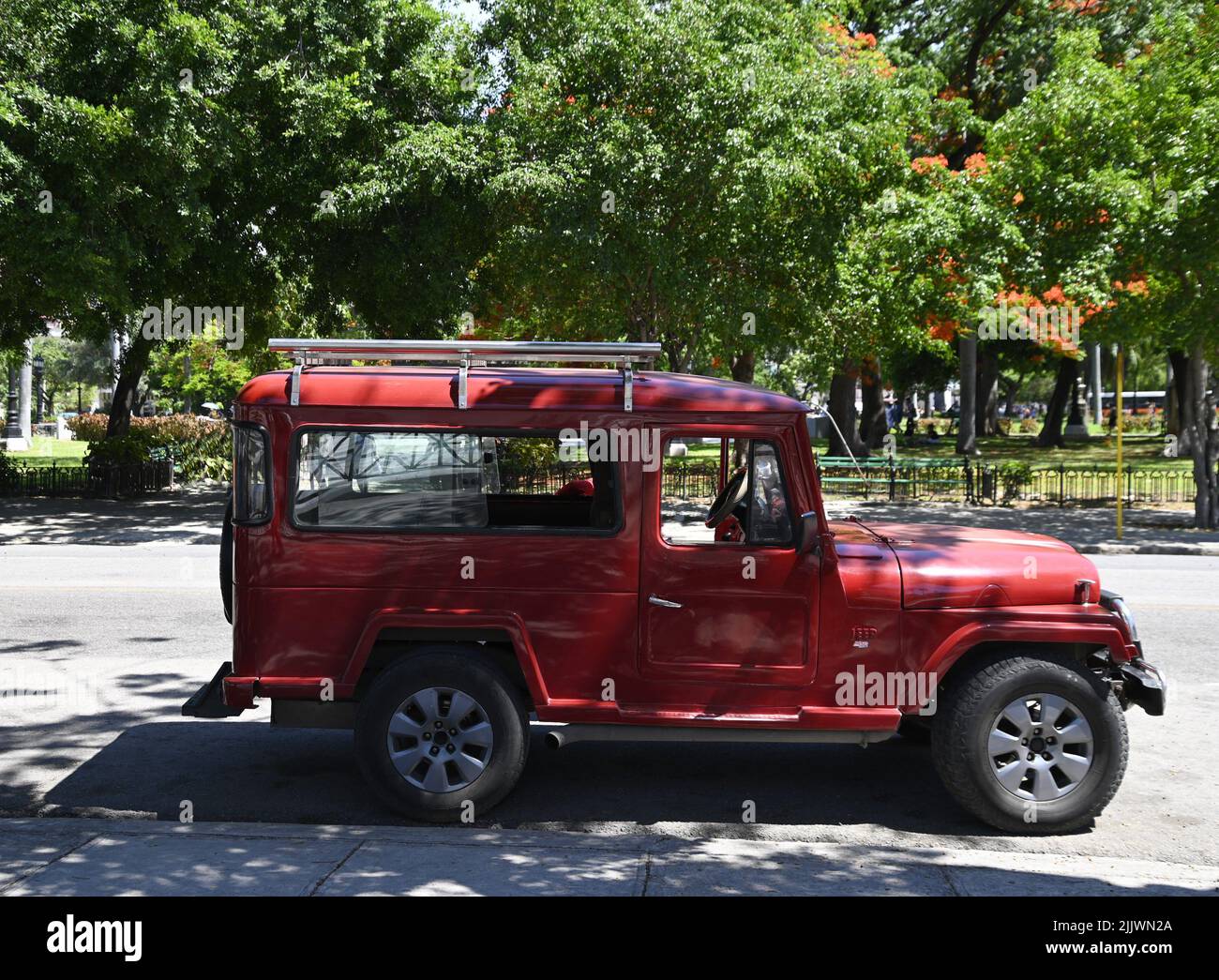 Vintage red Jeep on the streets of Havana, Cuba Stock Photo - Alamy
