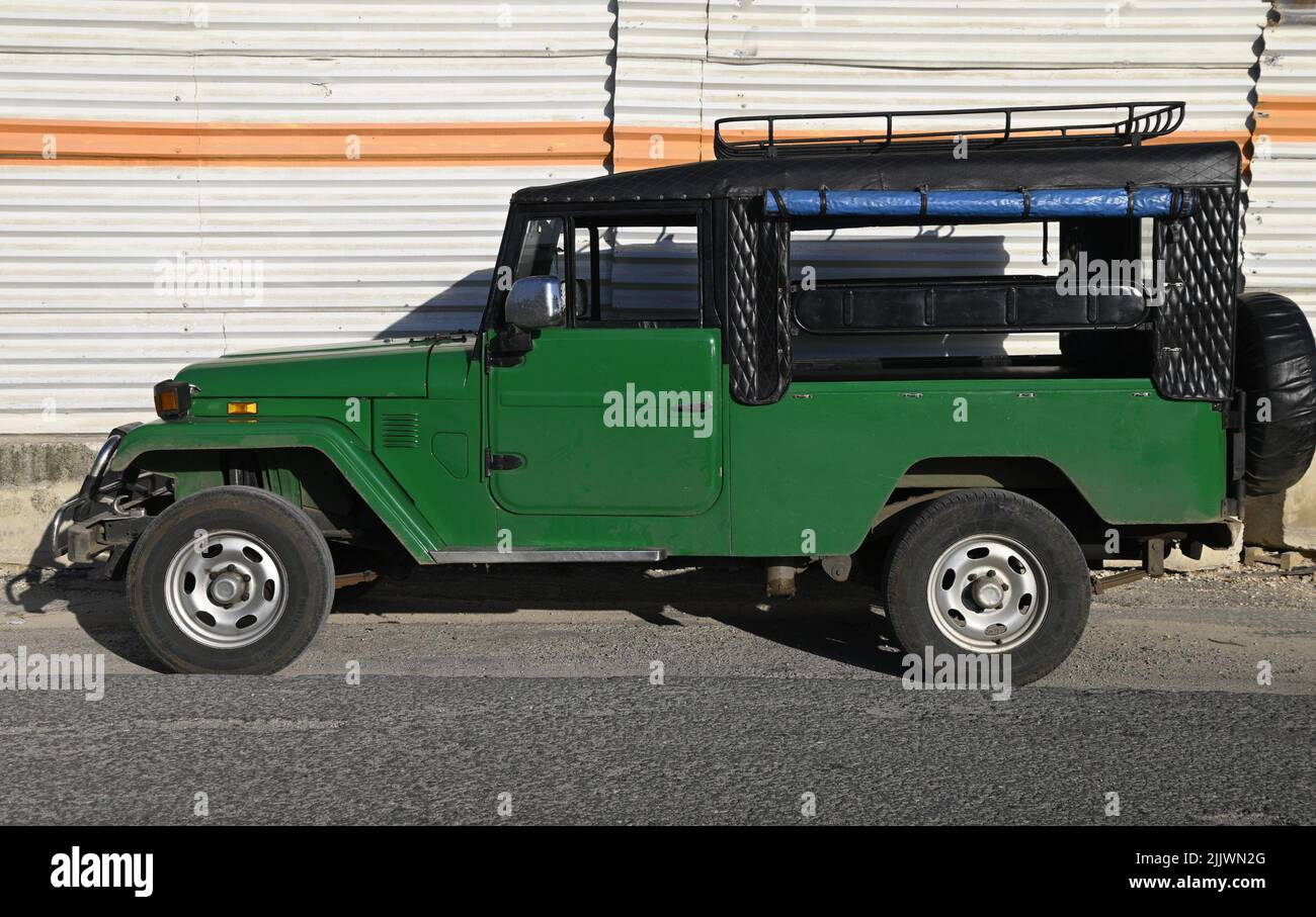 Vintage green Jeep Willy with a black top in Havana, Cuba Stock Photo ...