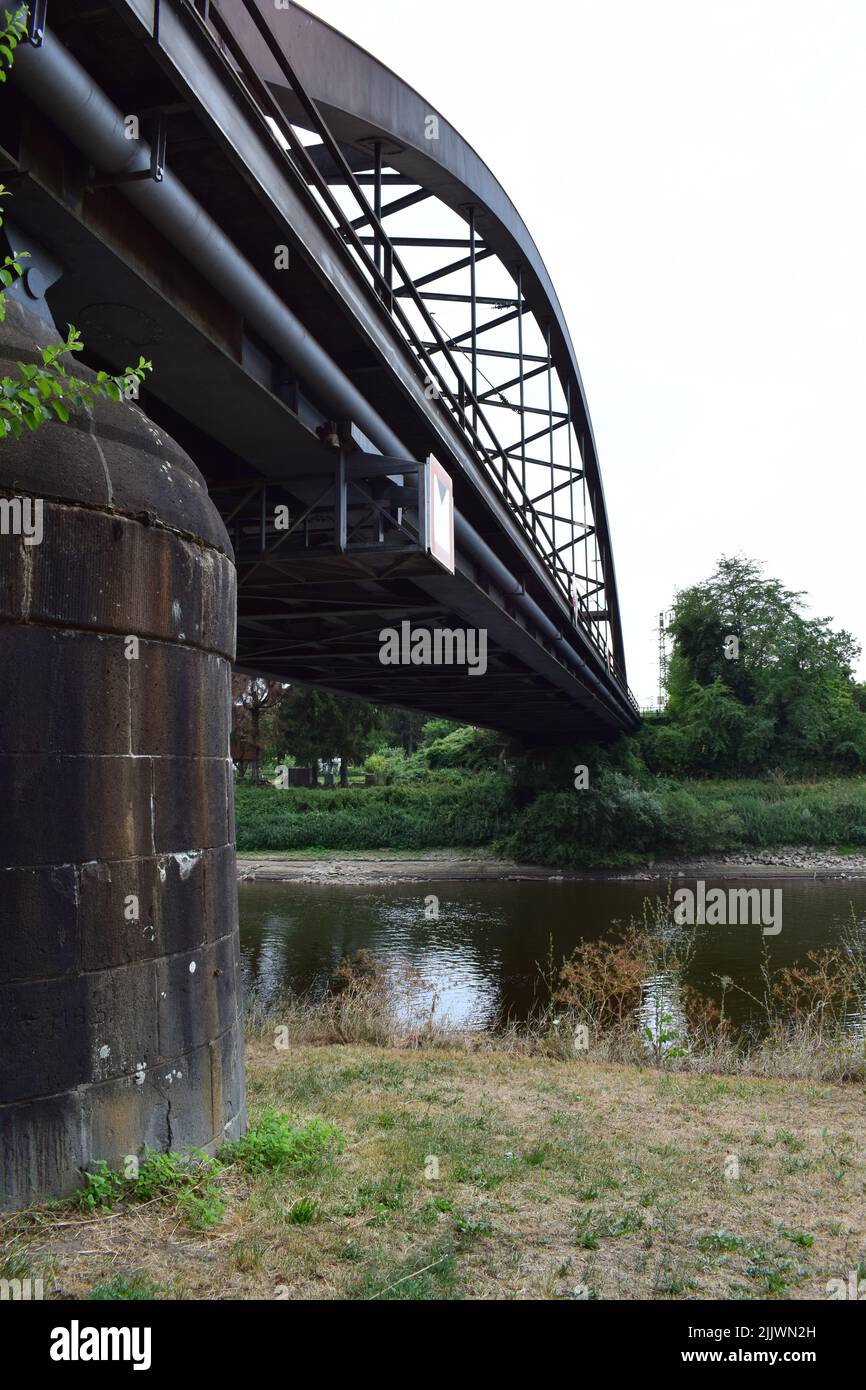 old railroad bridge built from stone and iron Stock Photo - Alamy