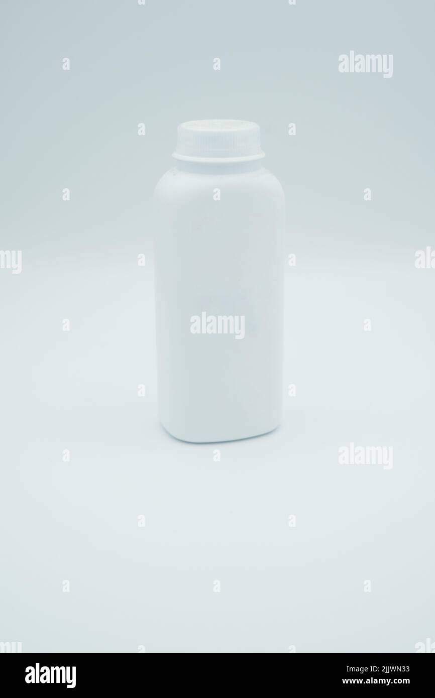 A vertical closeup shot of a baby powder container isolated on the ...