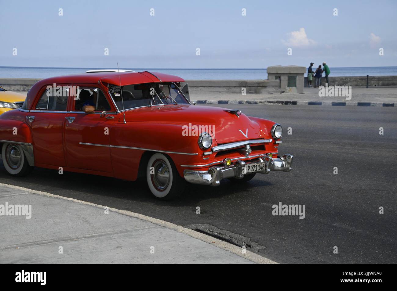 Vintage red 1950 Cadillac Roadmaster antique car with chrome plated ...