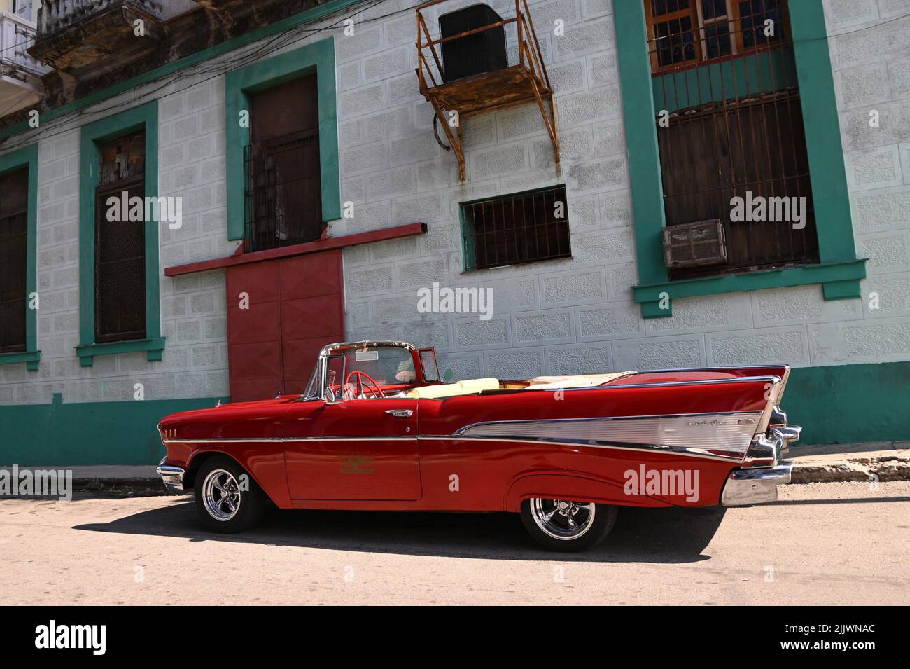 Vintage red convertible 1950 Chevrolet Bel Air with polished chrome ...