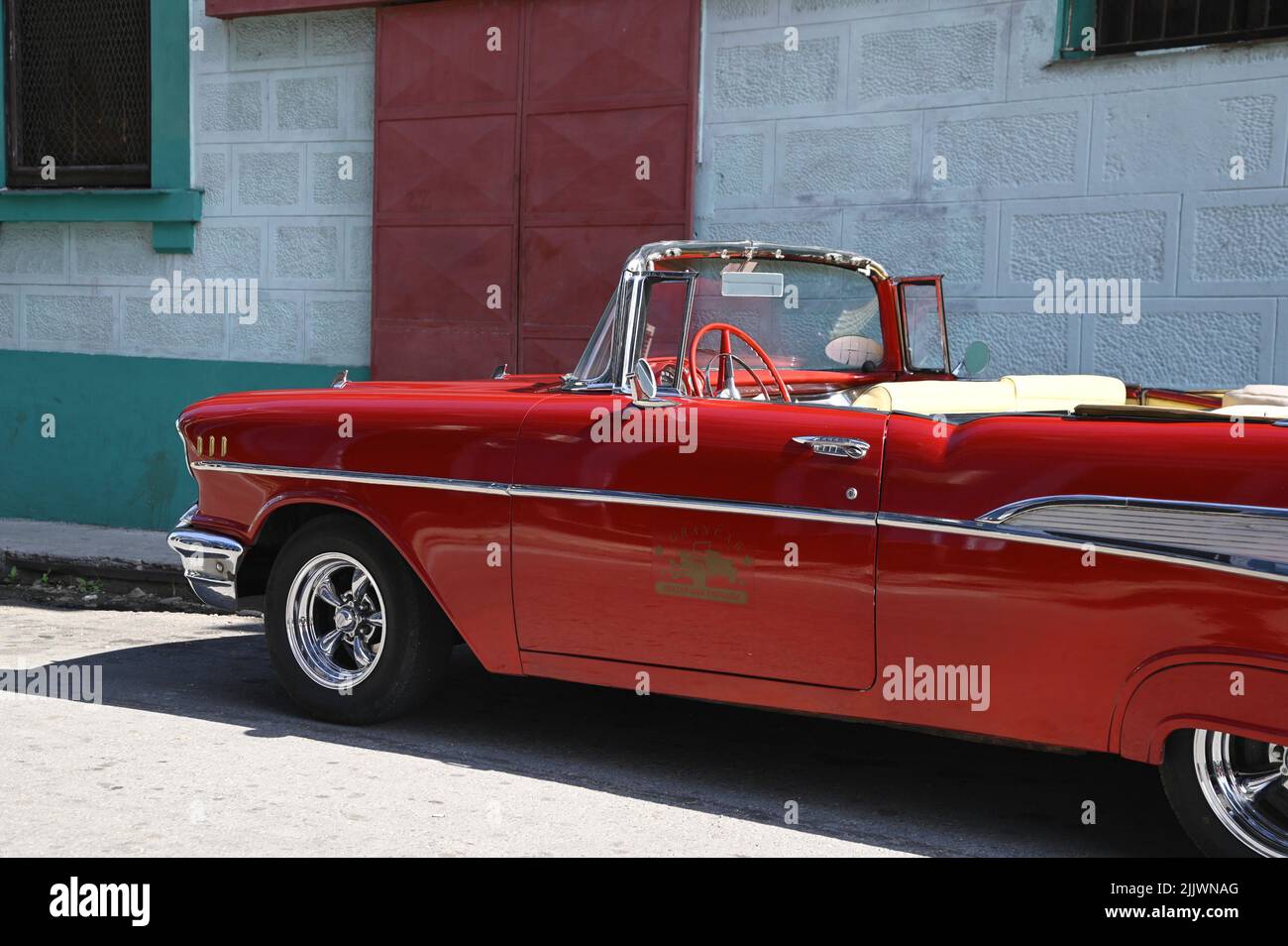 Vintage red convertible 1950 Chevrolet Bel Air with polished chrome ...