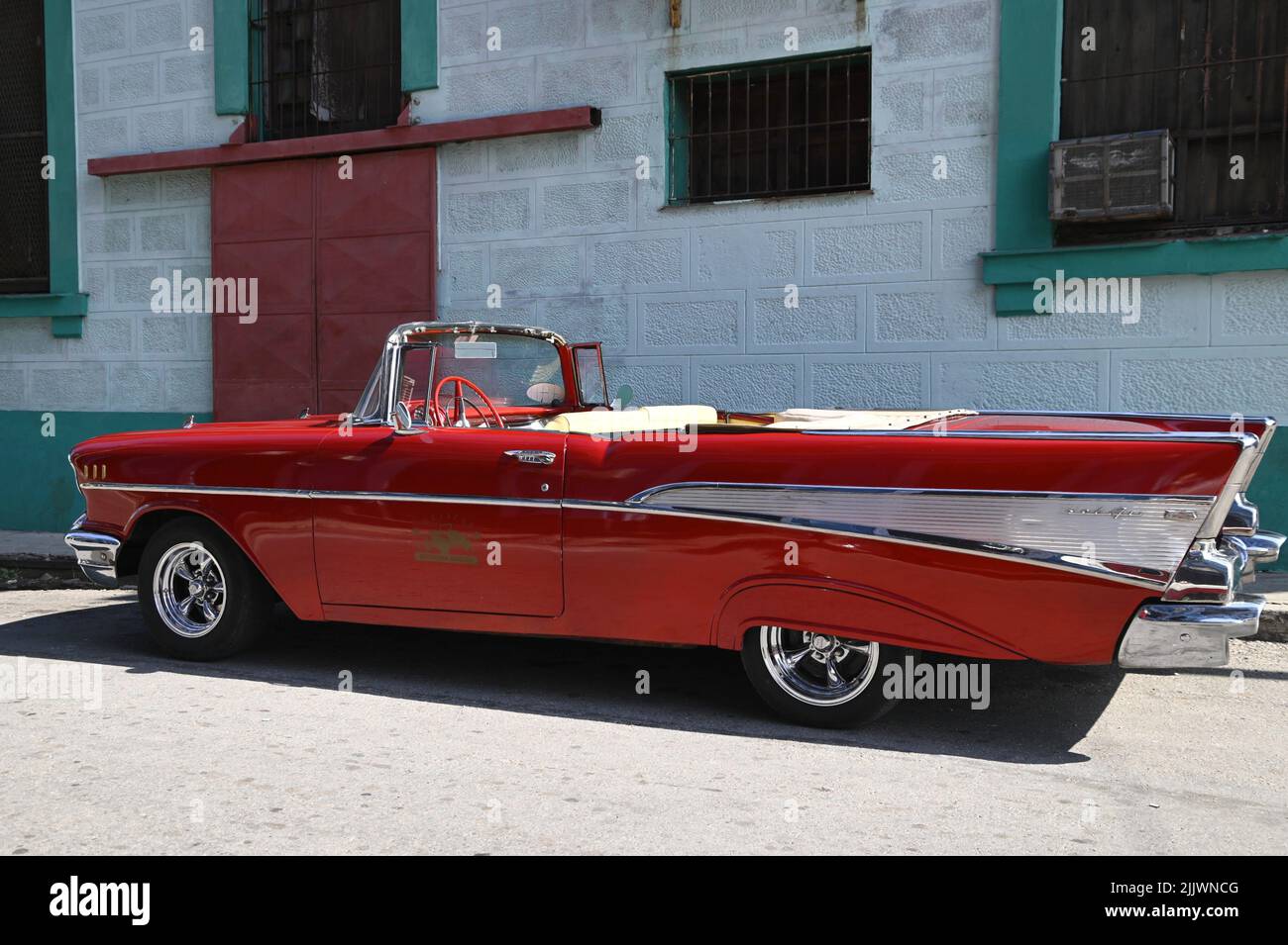 Vintage red convertible 1950 Chevrolet Bel Air with polished chrome ...