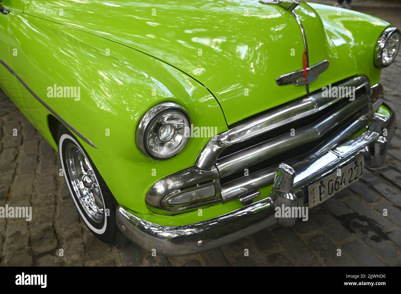 Vintage lime green 1956 Chevrolet antique car with a chrome plated ...