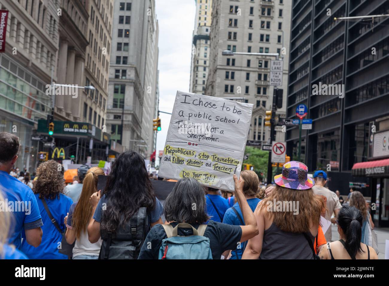Large crowd protesting guns. Walking from Cadman Plaza in Brooklyn over ...