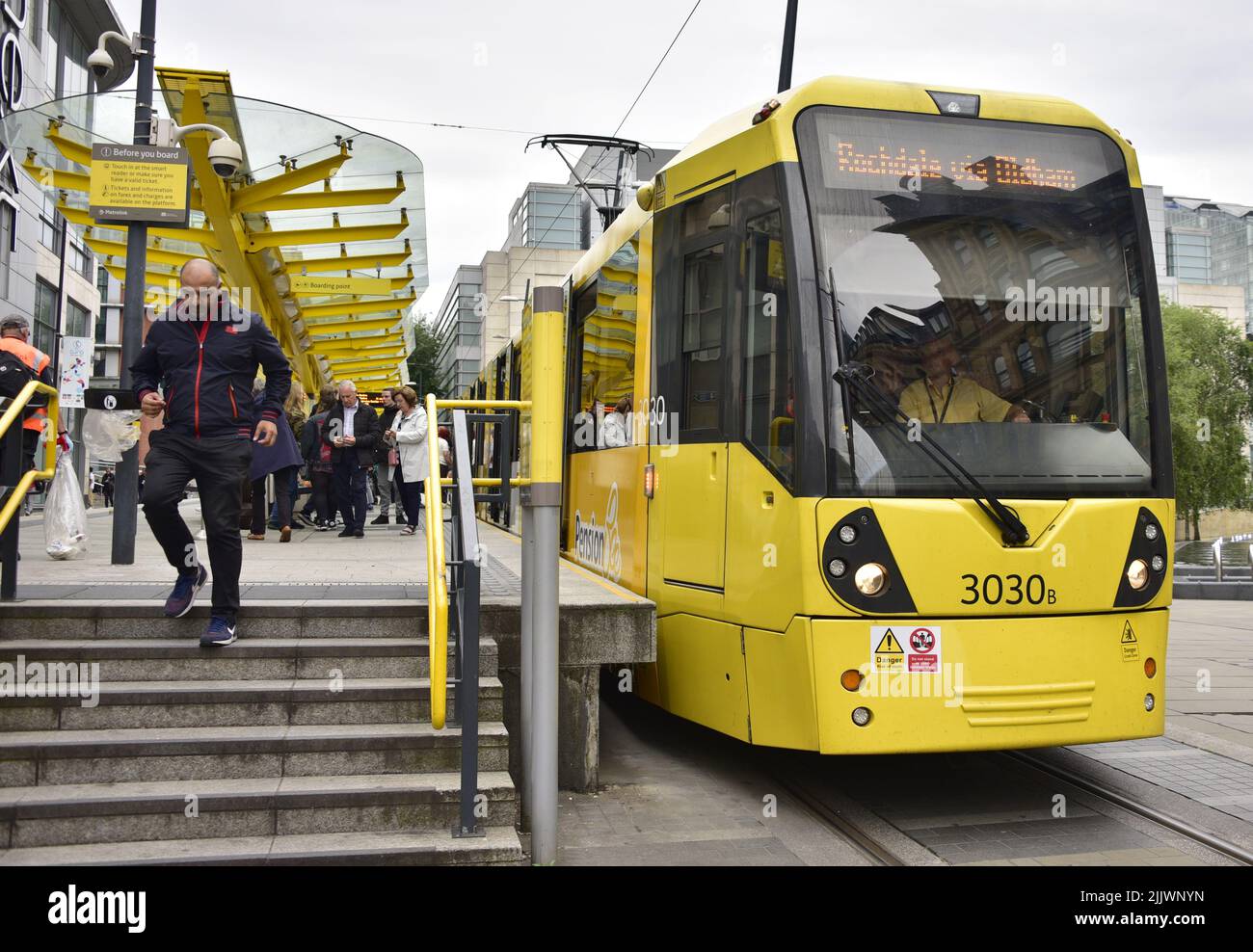 A Manchester Metrolink tram in the city centre, Manchester, Greater ...