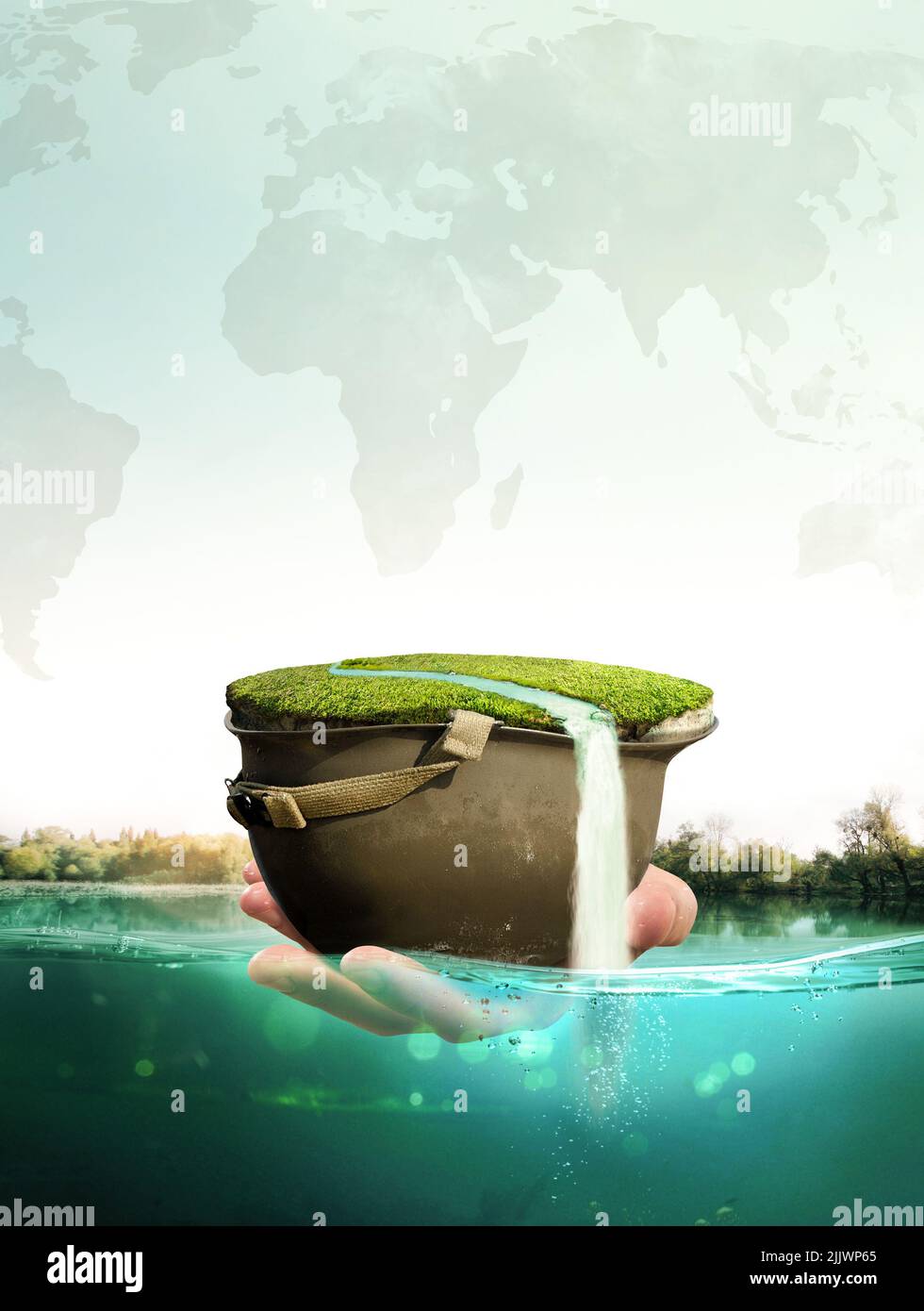 Hand holding helmet. Grass and stream in helmet. A work depicting World ...