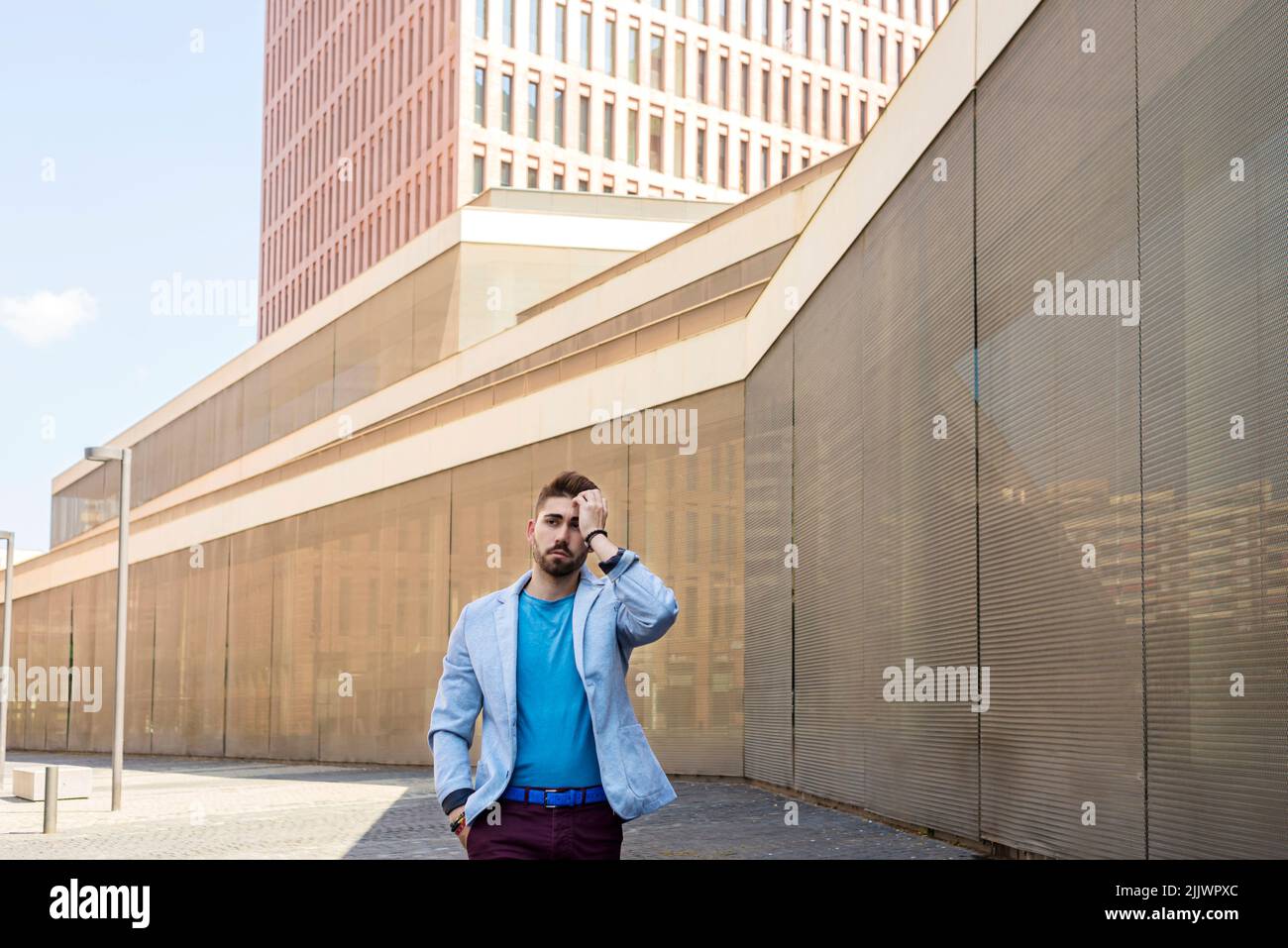 man, model of fashion, in urban background wearing casual clothes Stock ...