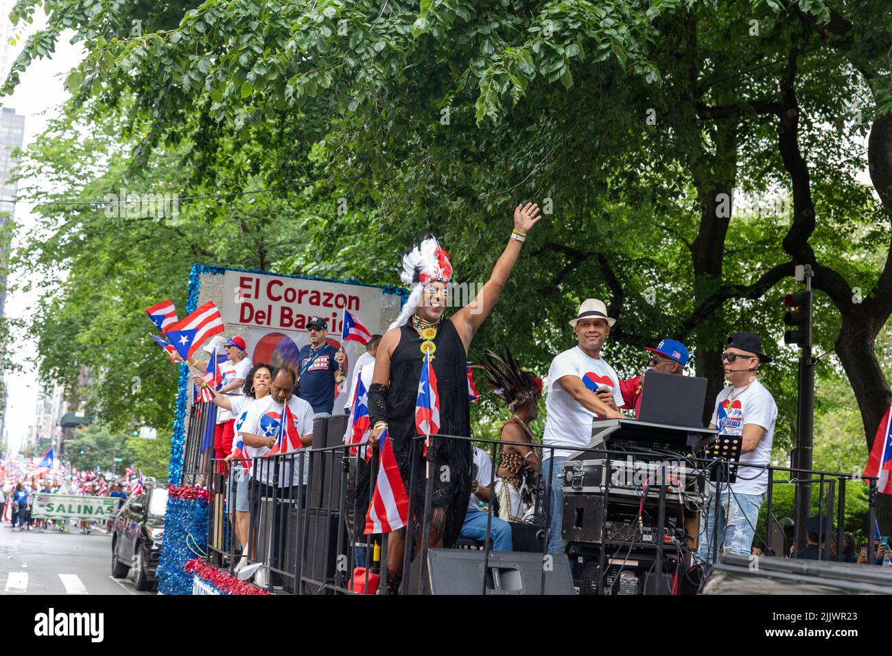 A large crowd of people coming out to celebrate the Puerto Rican Day ...