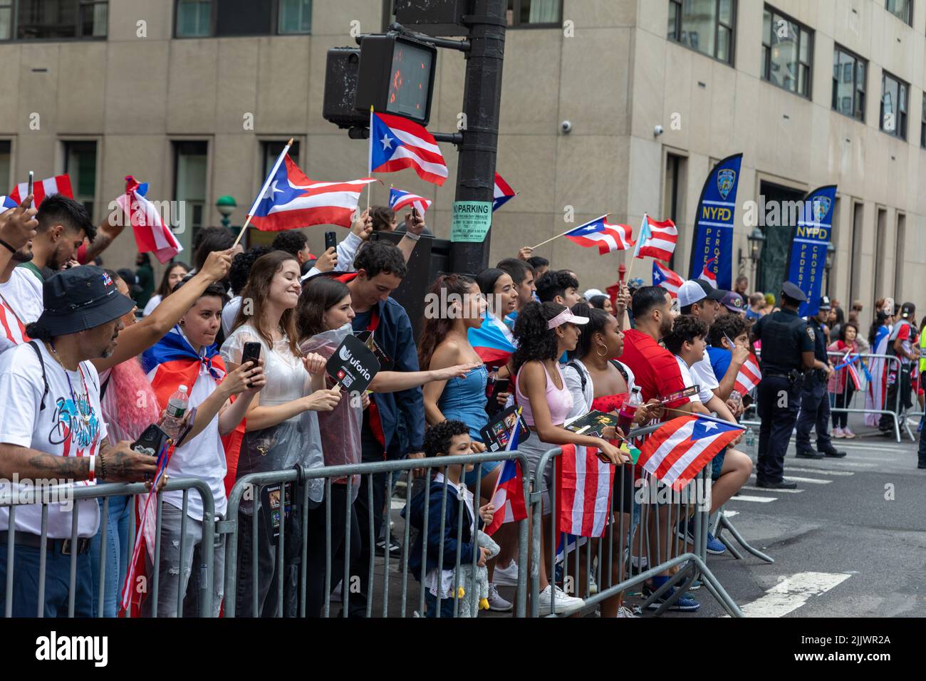 A large crowd of people coming out to celebrate the Puerto Rican Day ...