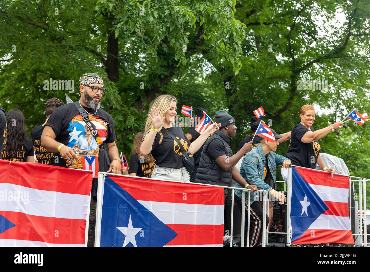 A large crowd of people coming out to celebrate the Puerto Rican Day ...