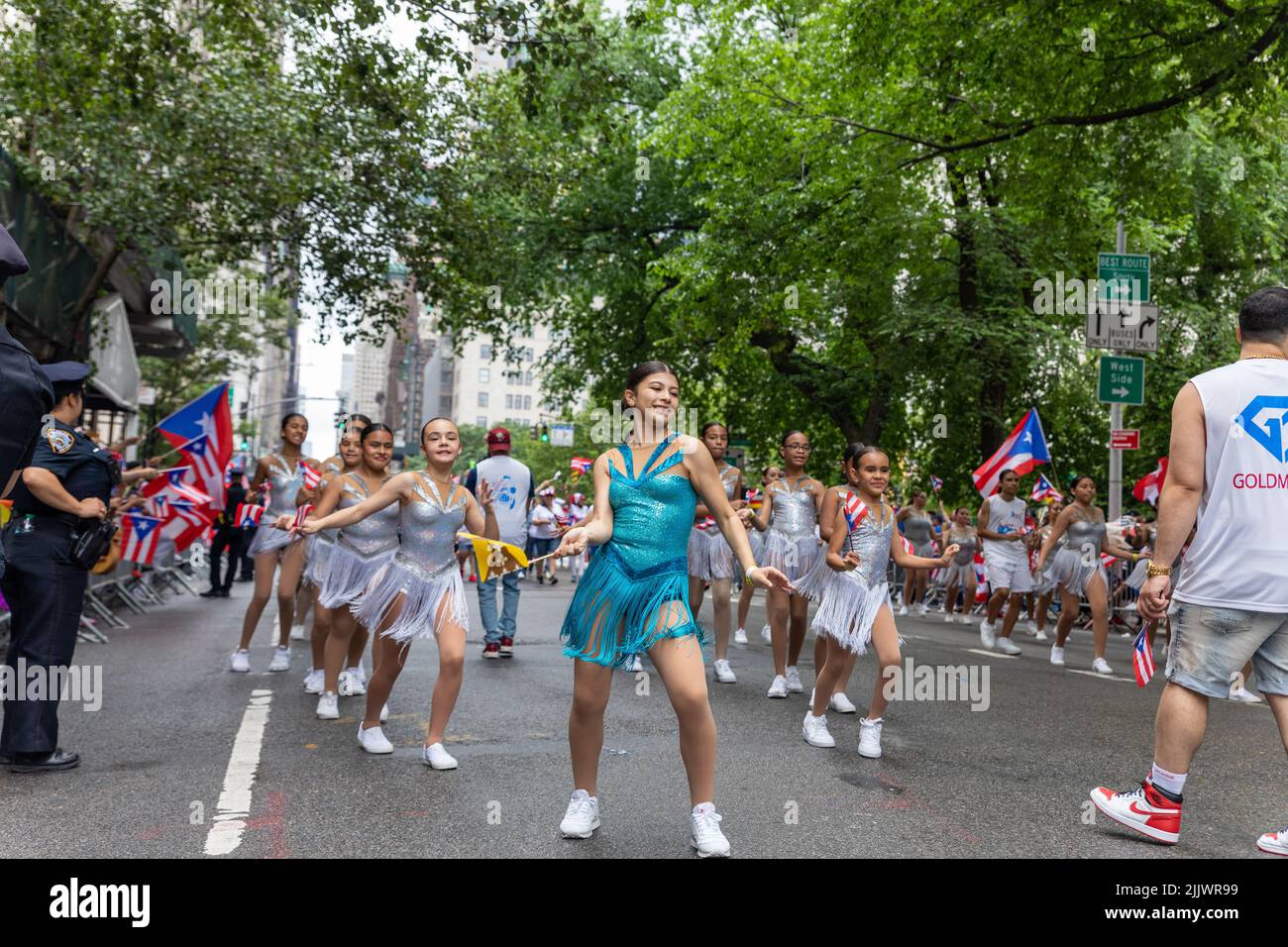 A large crowd of people coming out to celebrate the Puerto Rican Day ...