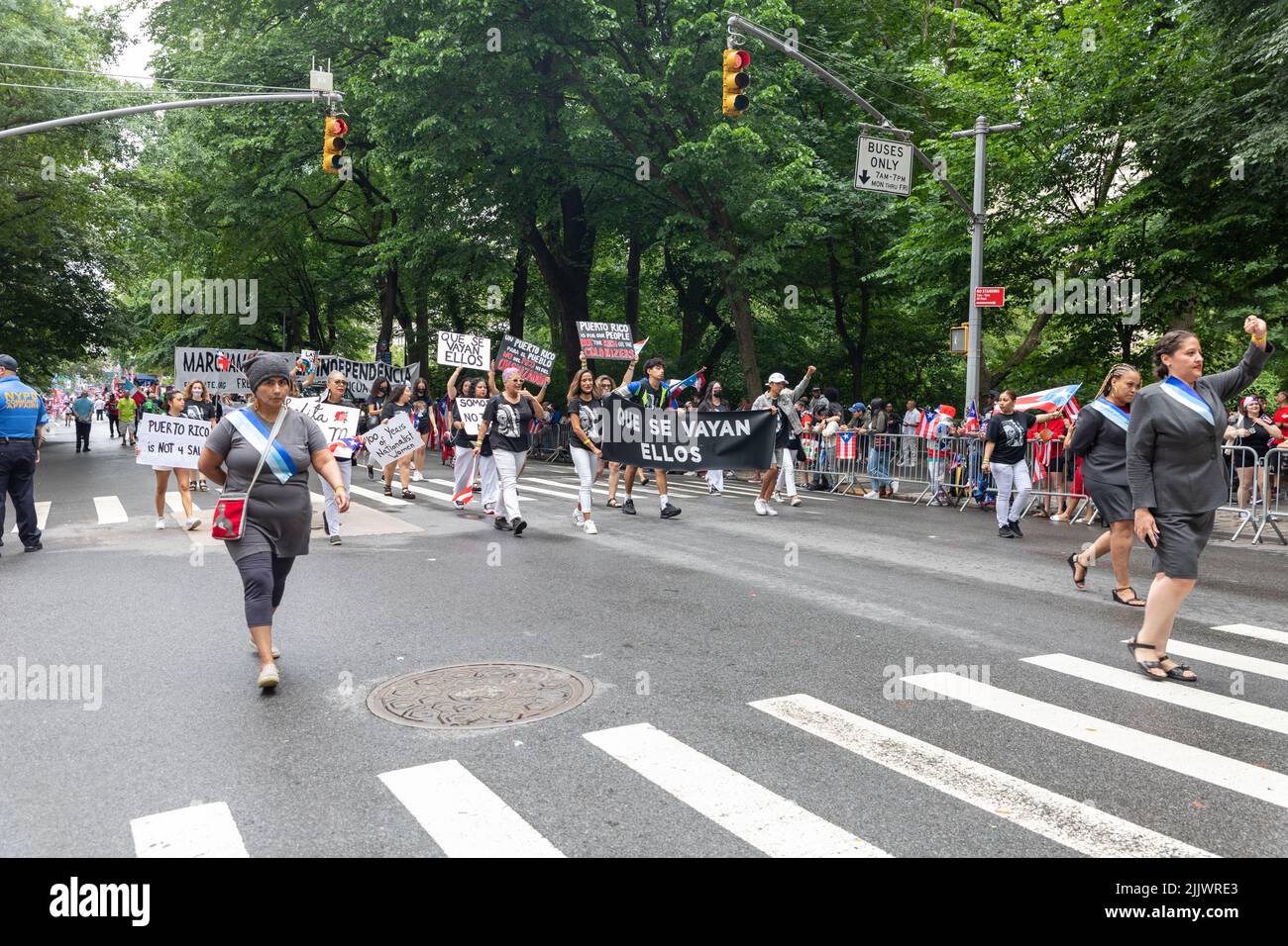 A large crowd of people coming out to celebrate the Puerto Rican Day ...