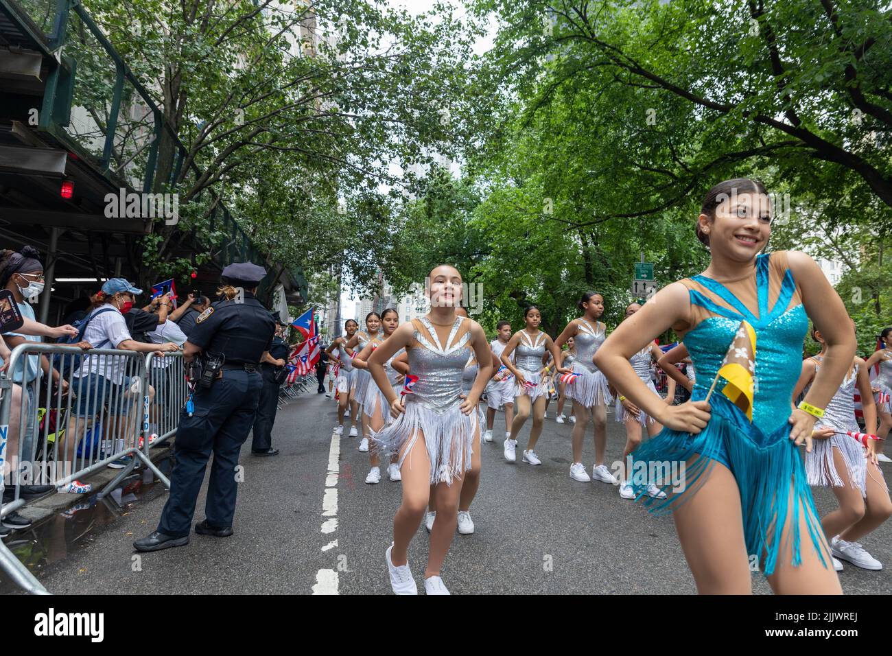 A large crowd of people coming out to celebrate the Puerto Rican Day ...