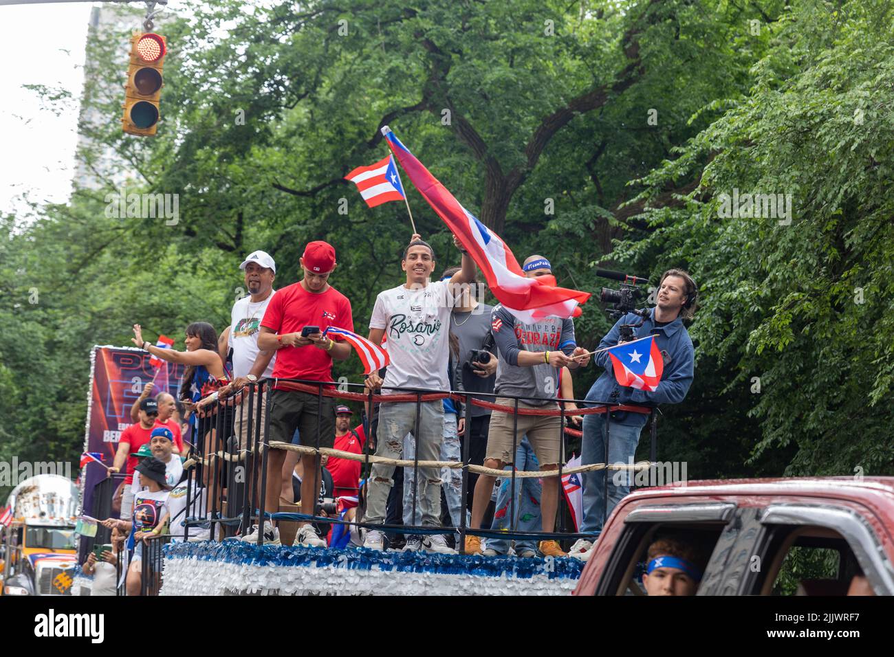 A large crowd of people coming out to celebrate the Puerto Rican Day ...