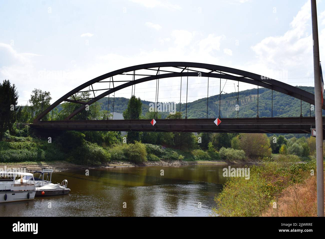 old railroad bridge built from stone and iron Stock Photo - Alamy