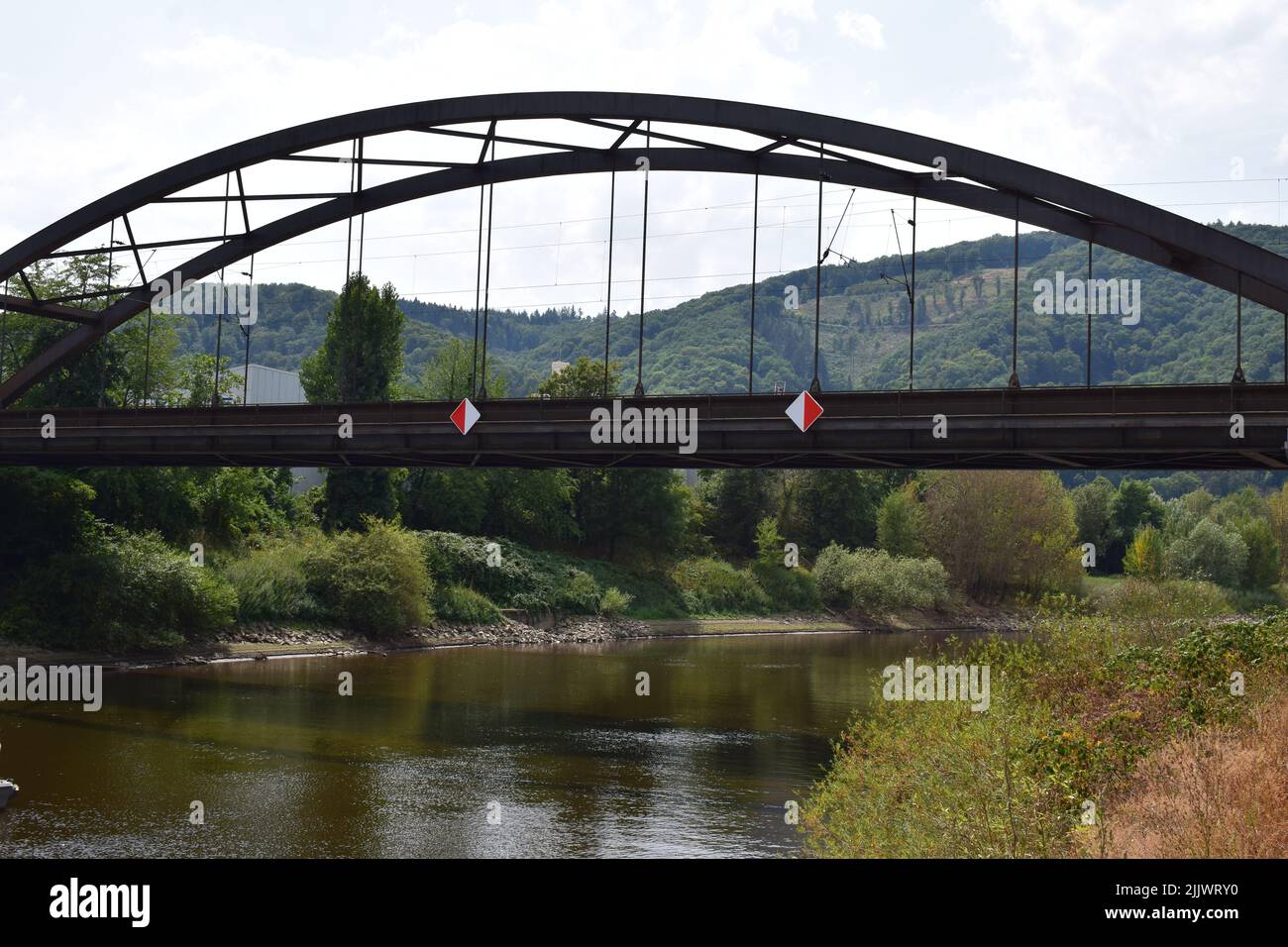 old railroad bridge built from stone and iron Stock Photo - Alamy
