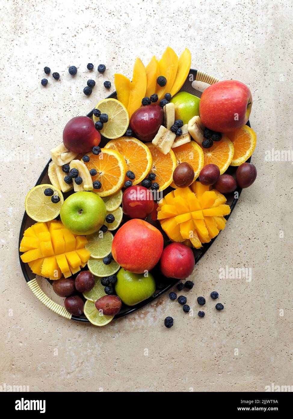 high angle view of healthy food grazing platter made with fresh fruit ...