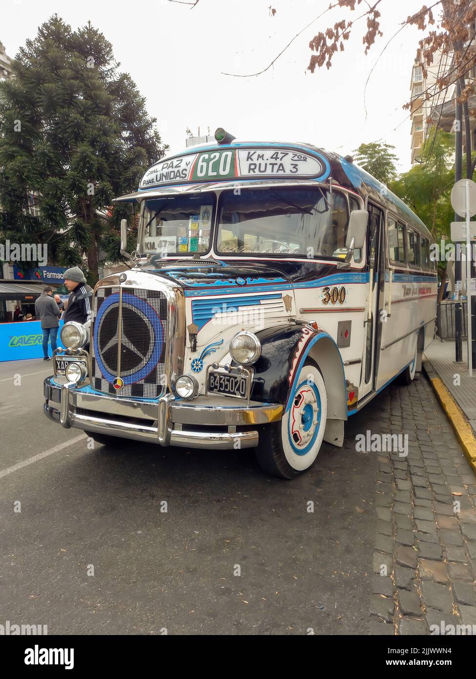 Old white Mercedes Benz 911 bus 1970s in the street. Public passenger ...