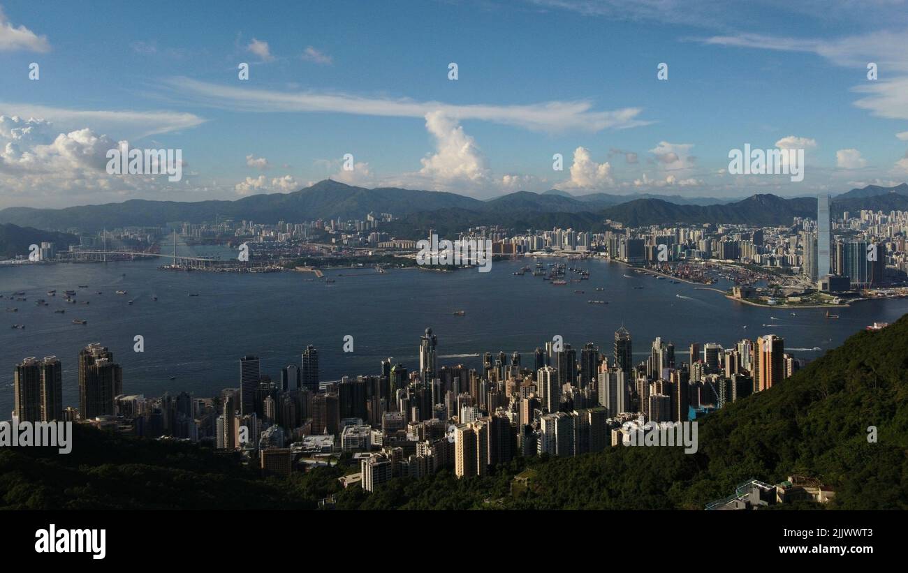 A wide angle shot of Hong Kong City skyline view from Victoria Peak ...