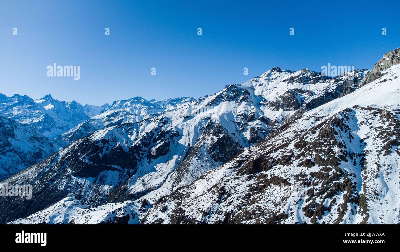 Aerial photos taken in the chilean Andes. Winter ascent of the "Cerro ...