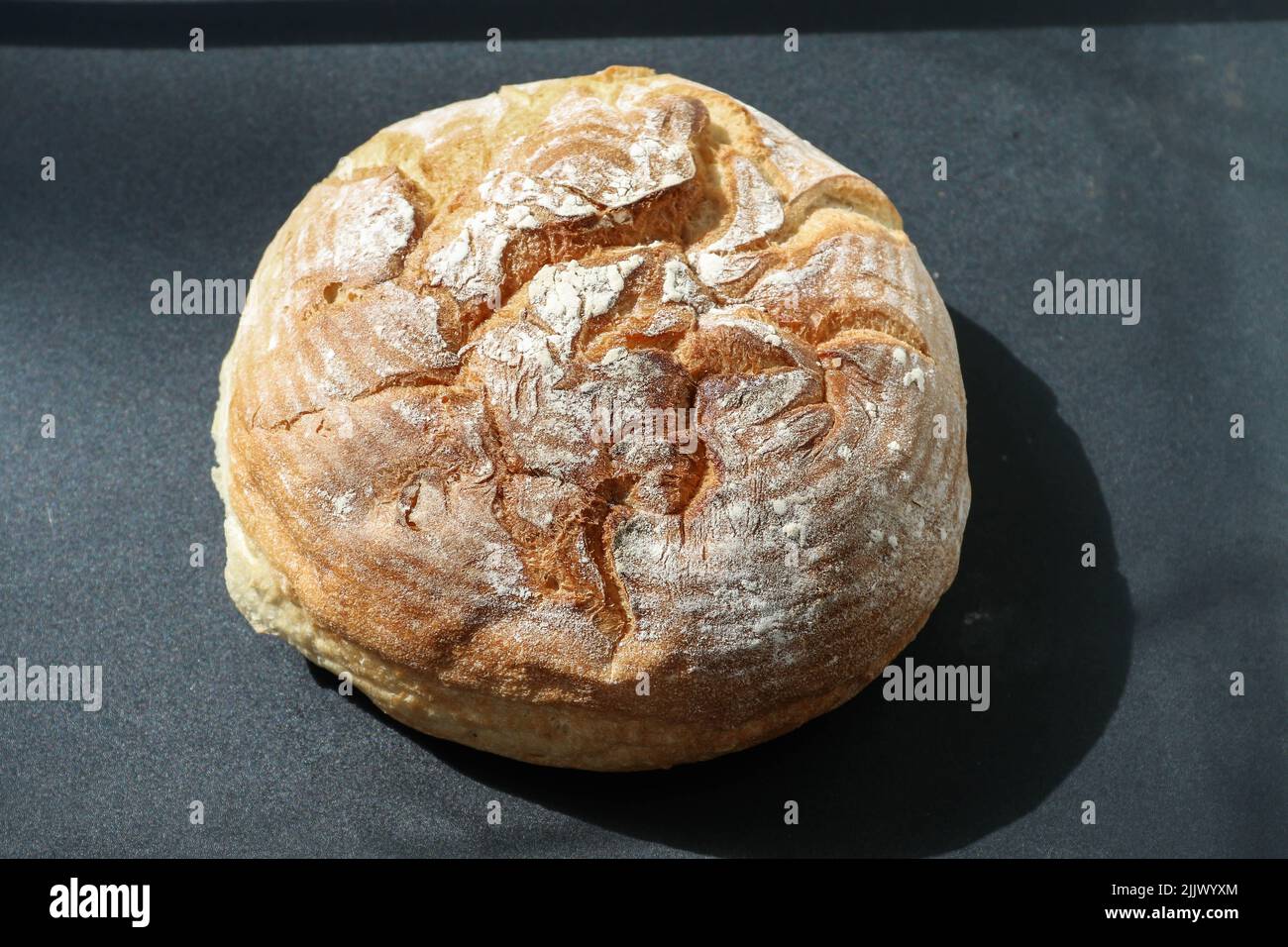 Bread is a staple food prepared from a dough of flour (usually wheat ...