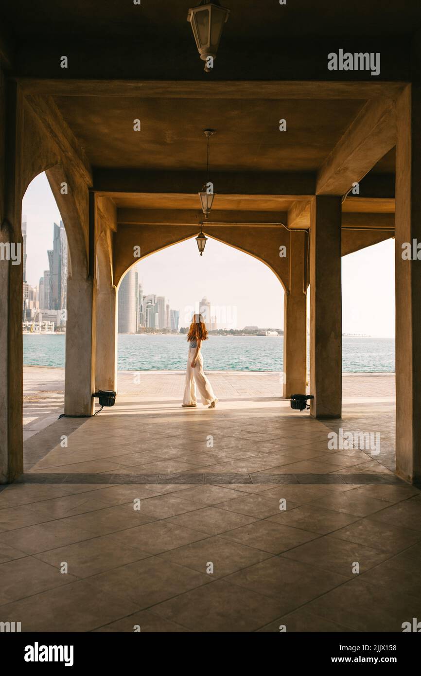 Walking under arch hi-res stock photography and images - Alamy