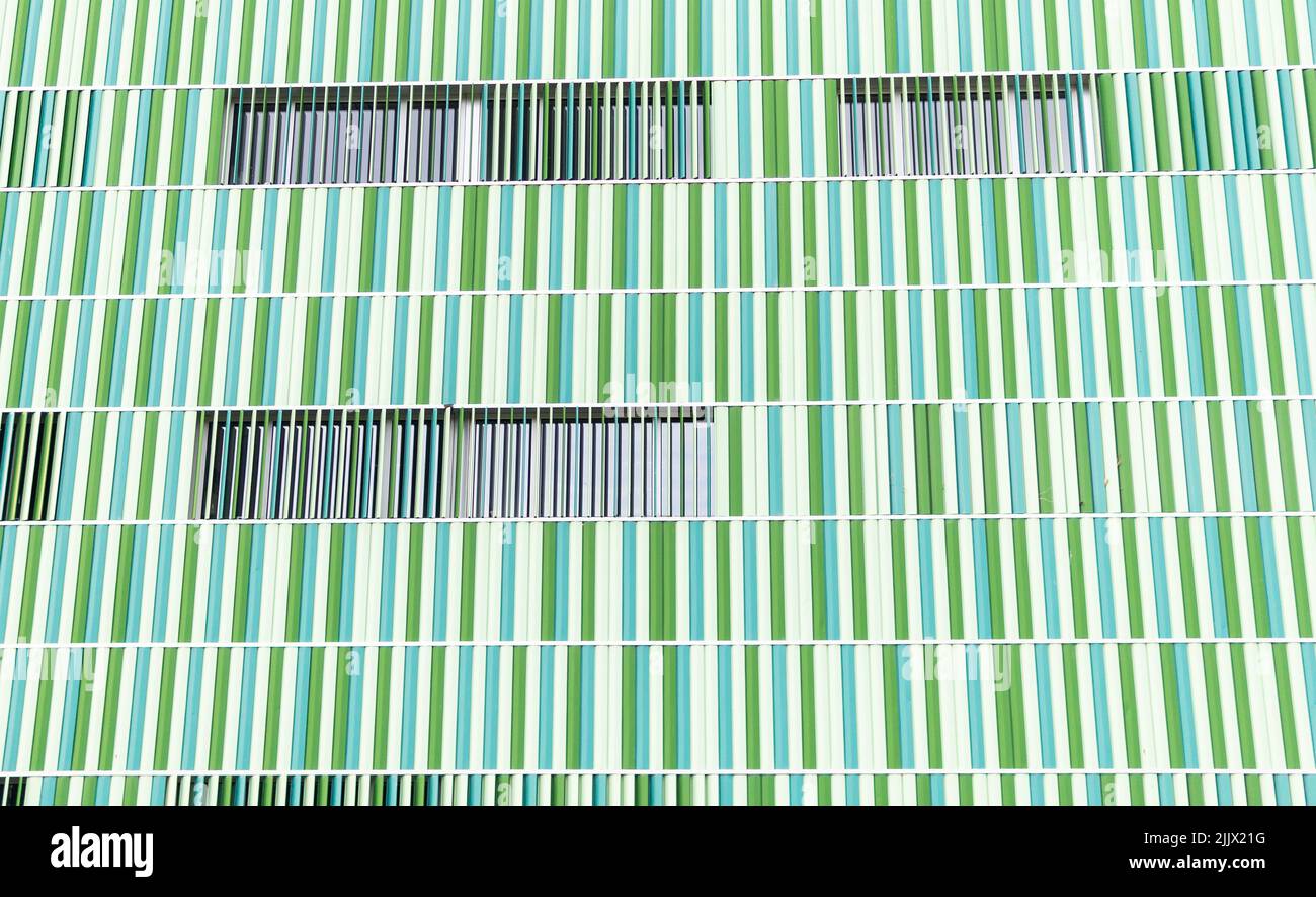 Full frame facade of contemporary multistory building with windows and ...