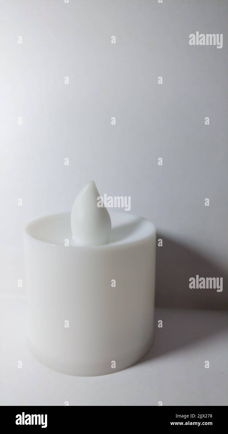 Candle light decorative in bright white light Stock Photo - Alamy