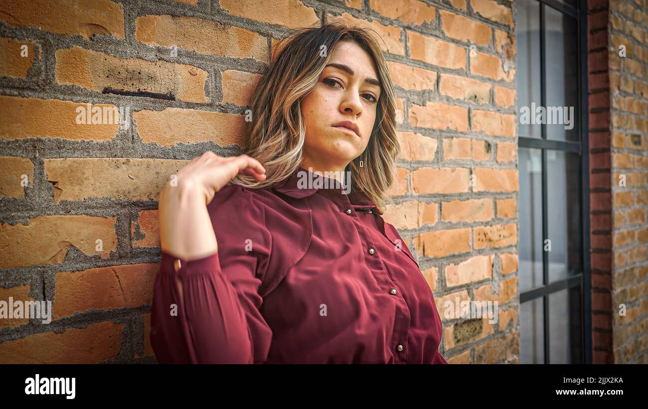 Woman poses leaning hi-res stock photography and images - Alamy