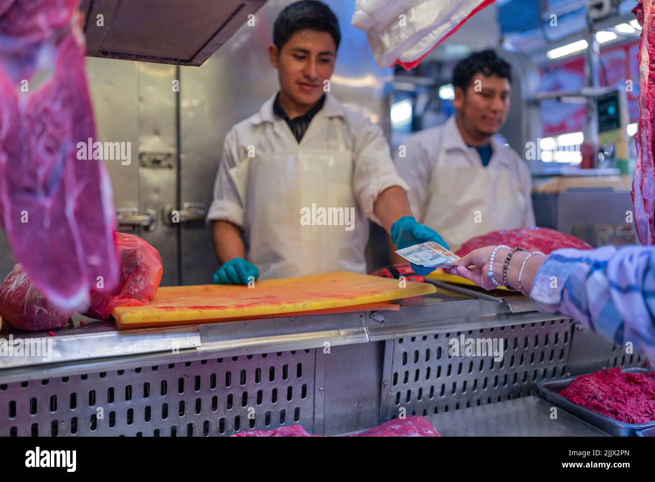 Female employee local butcher hi-res stock photography and images - Alamy