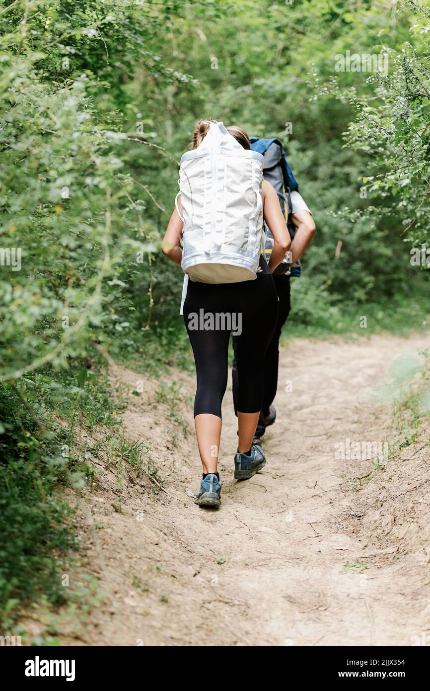 Back view of two hikers with backpacks hi-res stock photography and ...