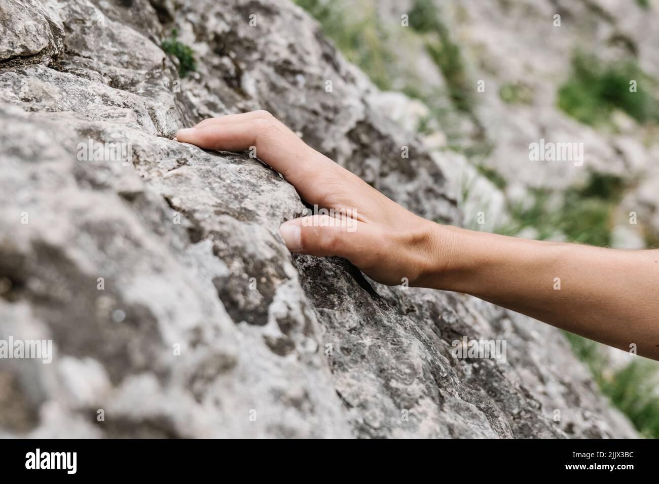 Hand gripping rock hi-res stock photography and images - Alamy