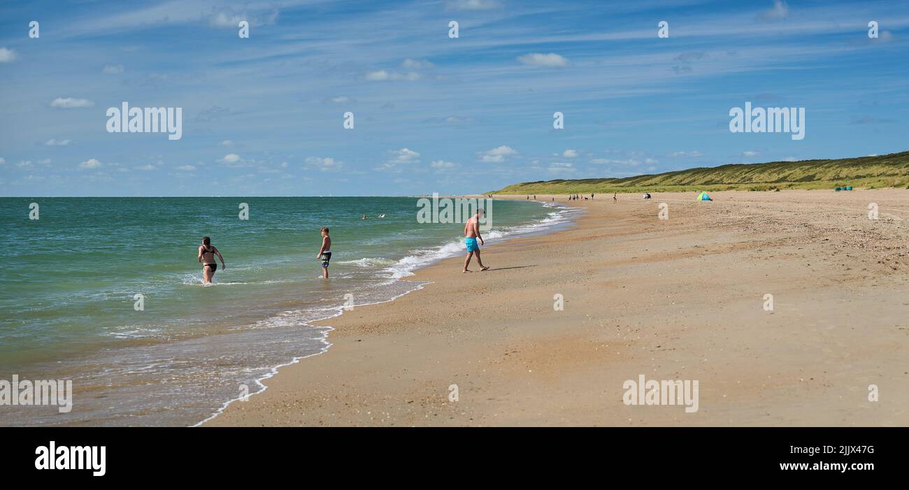 2022-07-27 16:36:28 OUDDORP - Beachgoers on the beach. The beach of ...
