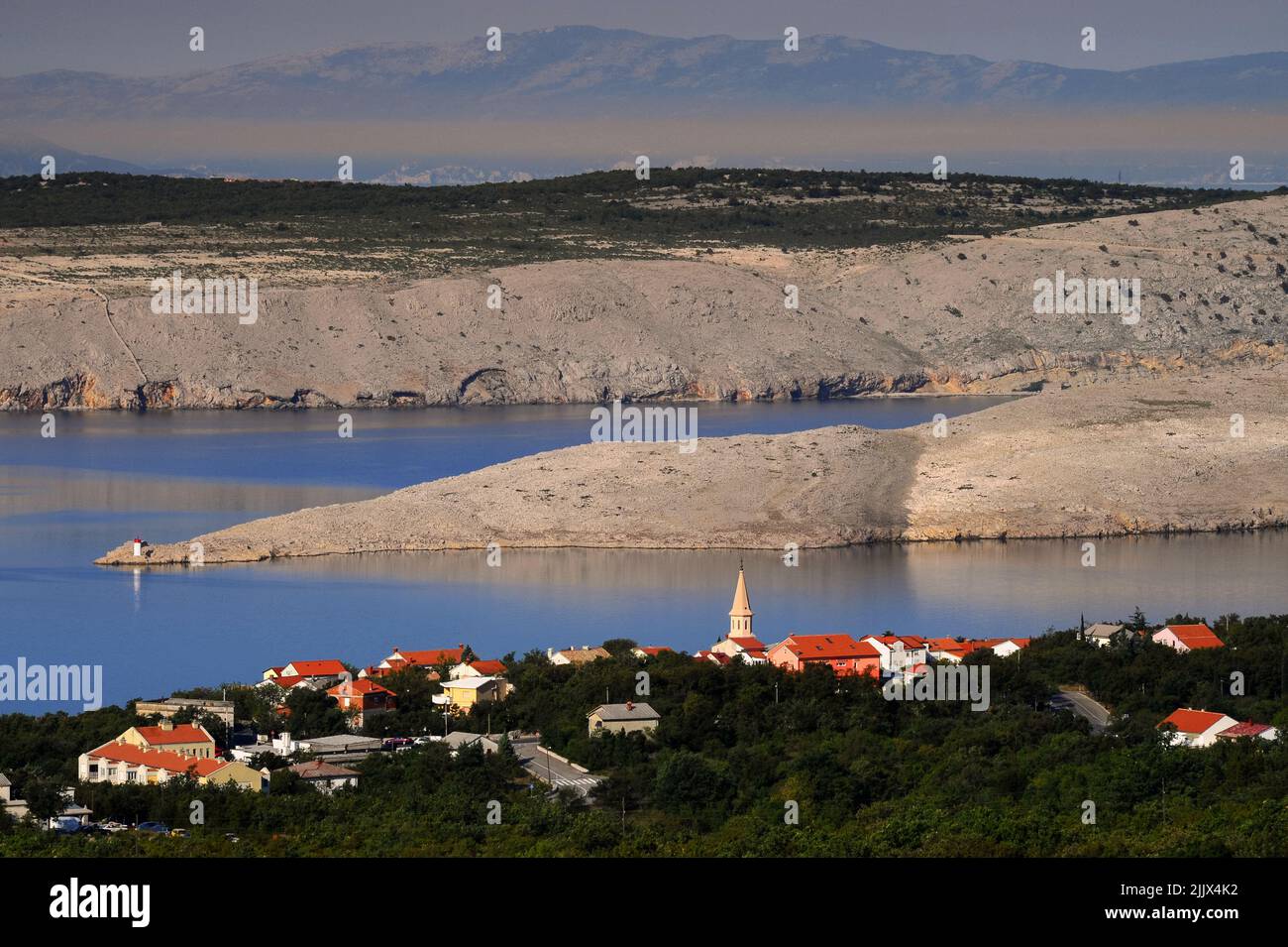 Pale pinkish-orange industrial atmospheric pollution hanging in still ...