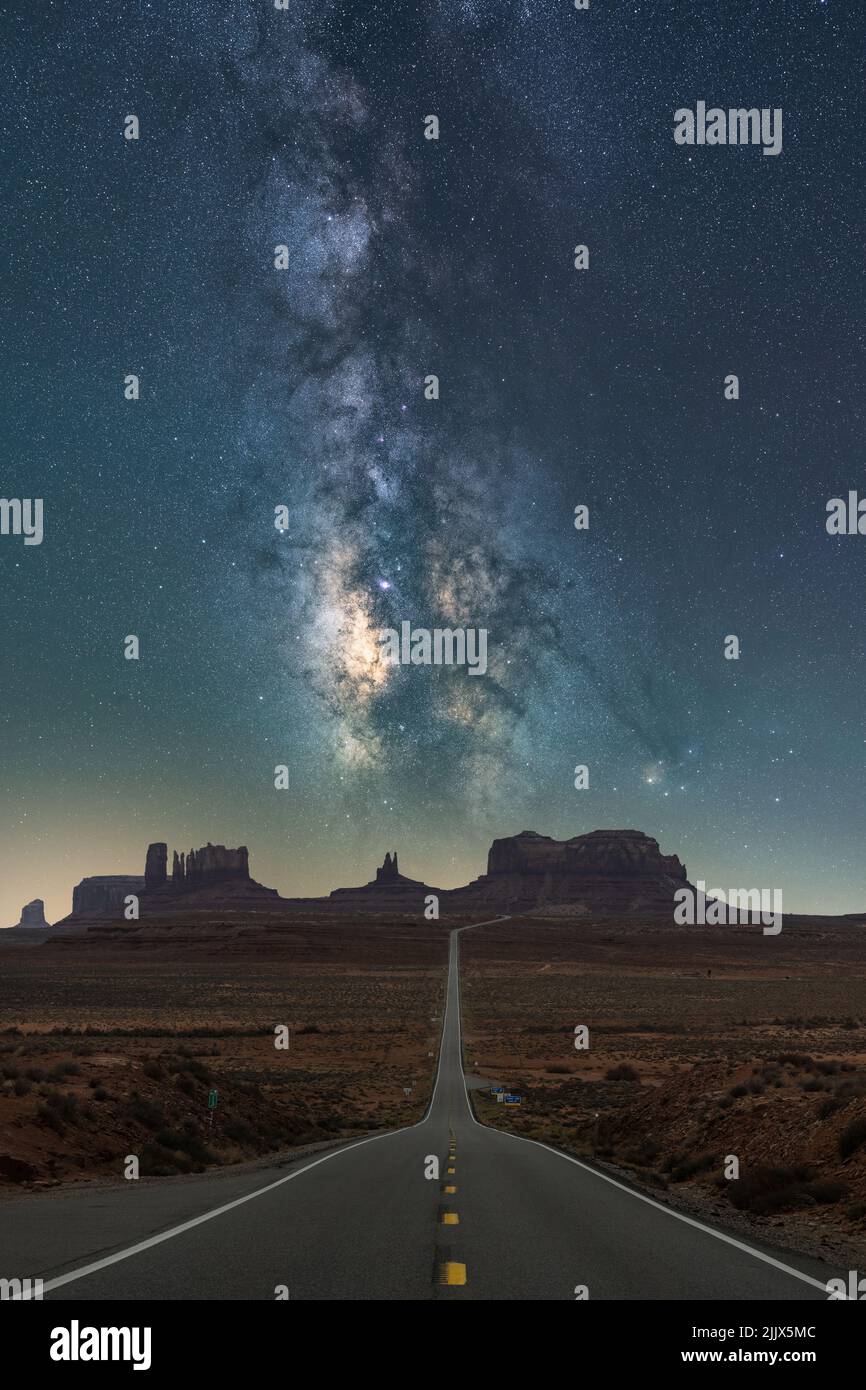 Breathtaking scenery of mountain formations with starry sky in between ...