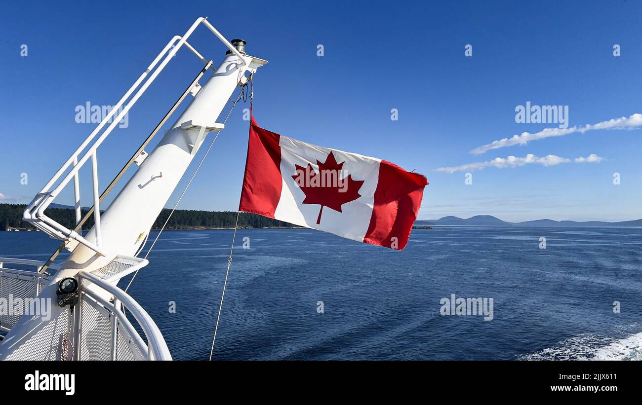 The close-up view of Canadian flag hanging from the boat before ...