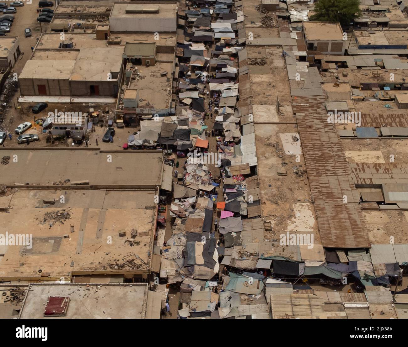 Aerial photo of a market street covered with awnings in Nouakchott ...