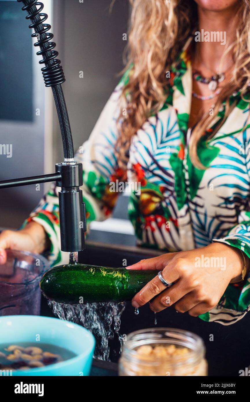 Cucumber washing hi-res stock photography and images - Alamy