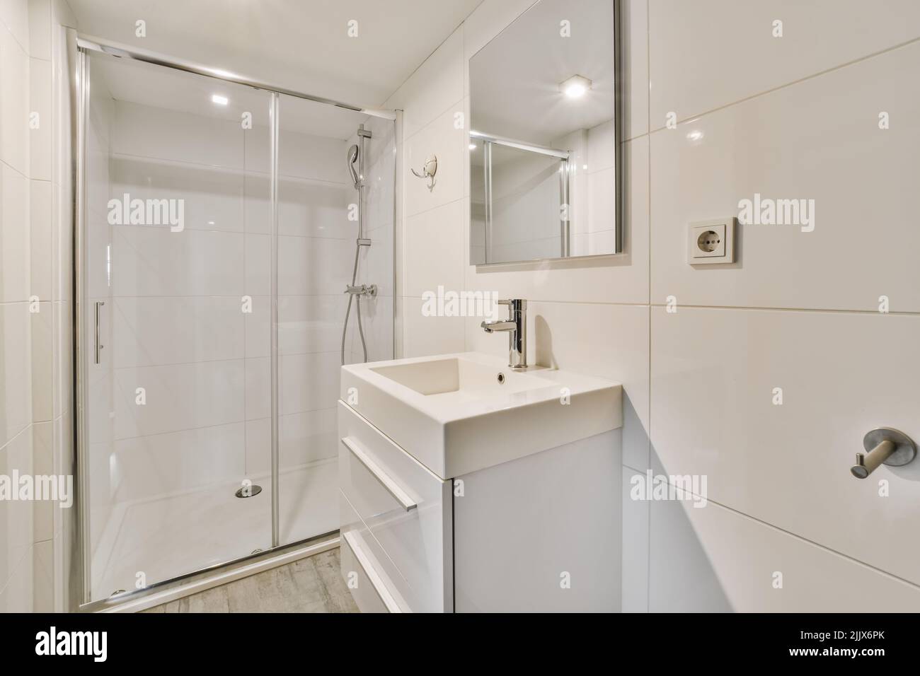 Interior of a sink with a shower closed with a screen Stock Photo - Alamy