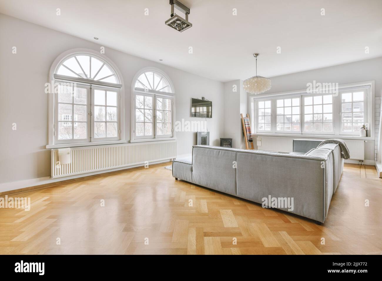 Interior of modern home with furniture next to a bright window Stock ...