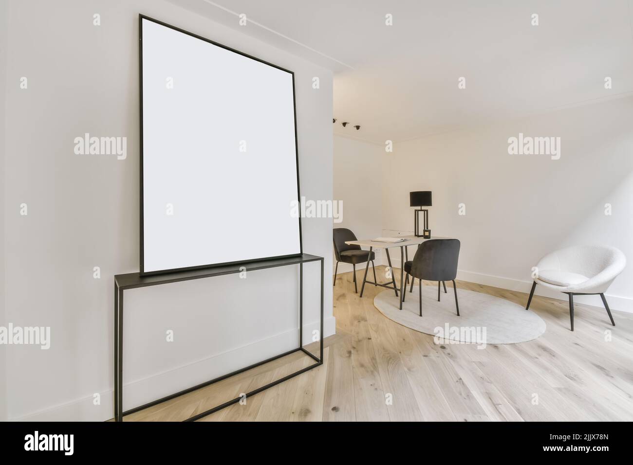 White screen on table in modern room Stock Photo - Alamy