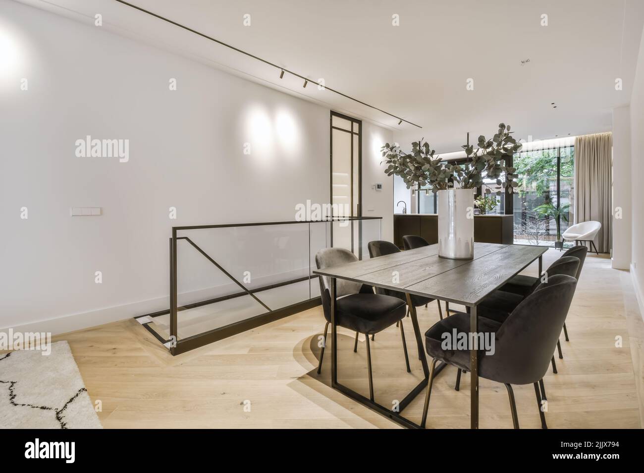 Interior of modern room with dining and sitting area Stock Photo - Alamy